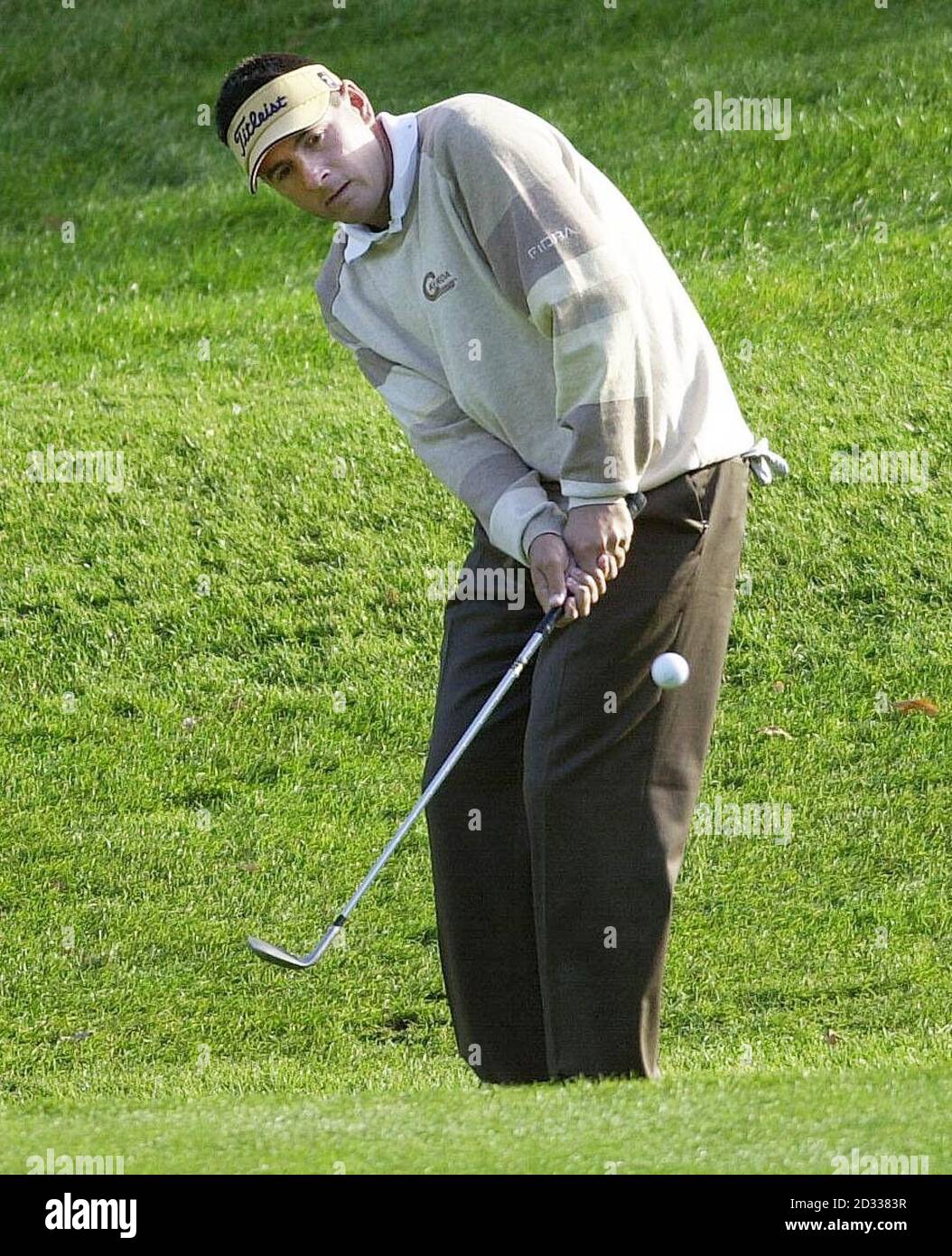 Open Champion and number 3 seed, USA's Ben Curtis, plays a chip shot to ...