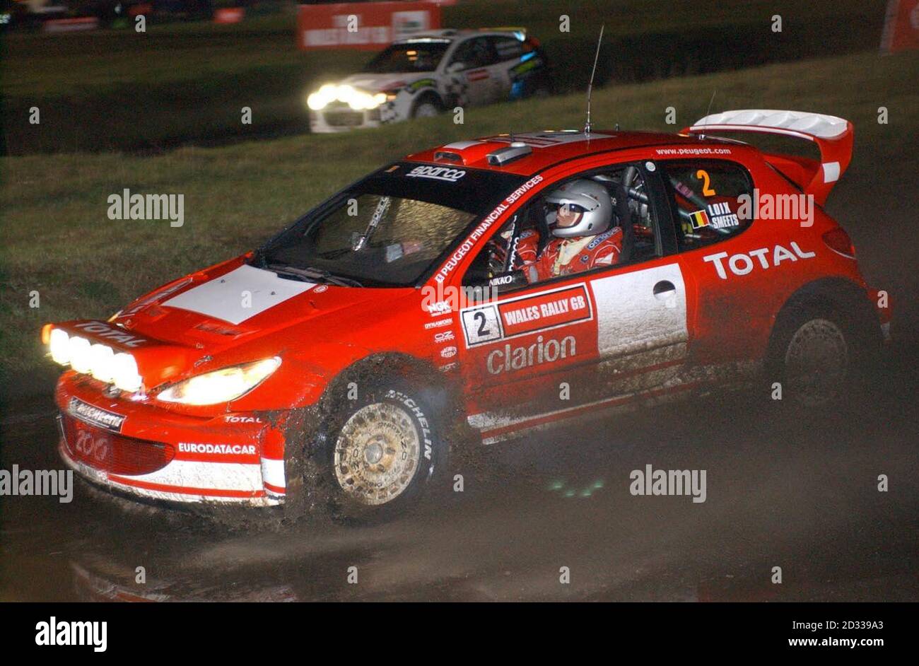 Belgium's Freddy Loix and Sven Smmets in a Peugeot 206 WRC drive in Leg ...