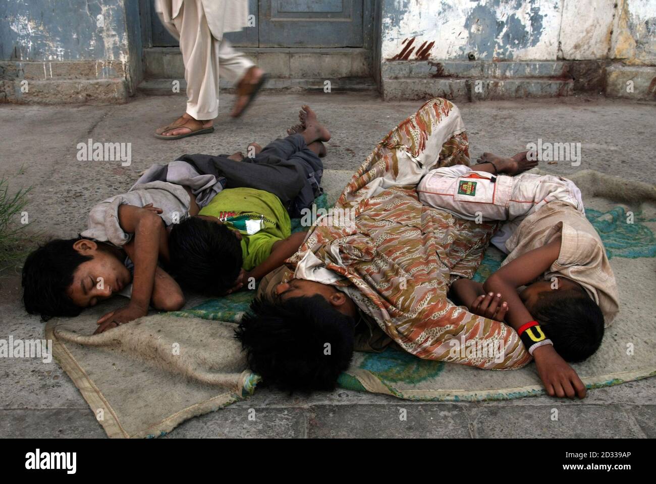 Pakistani boy sleeping hi-res stock photography and images - Alamy