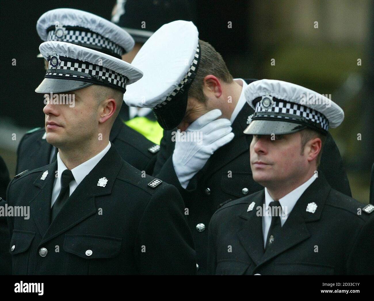 Which was being attended by hundreds of police officers hi-res stock ...