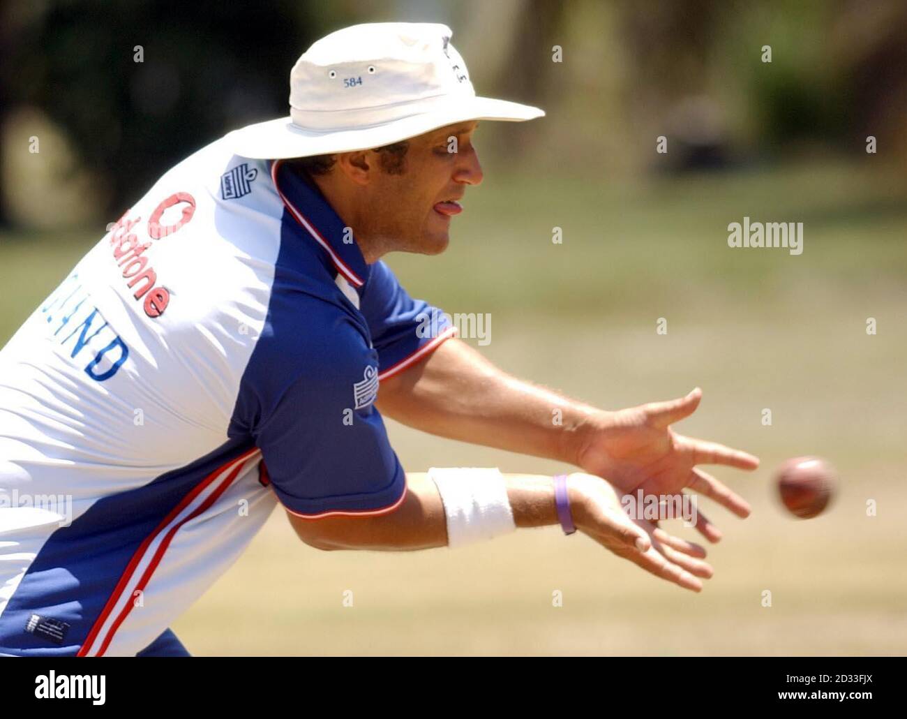 England's Mark Butcher practices slip catching during practice at the ...