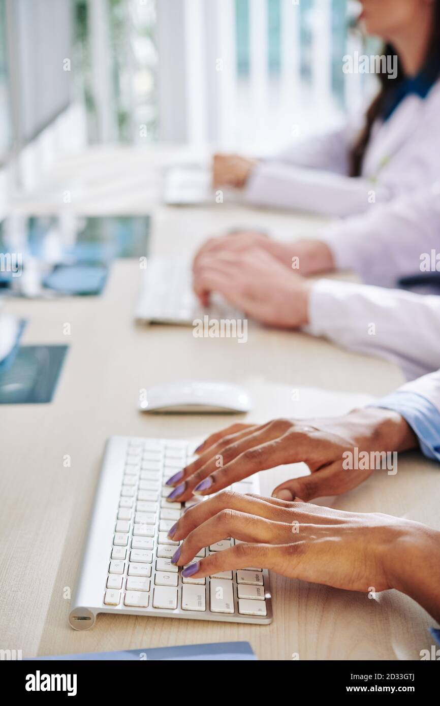 Female scientist working on computer Stock Photo - Alamy