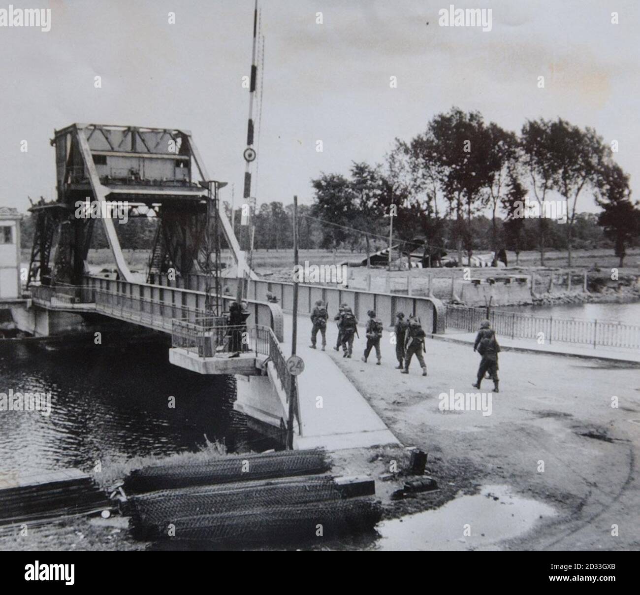 Troops crossing Pegasus Bridge - a river crossing close to the Normandy ...