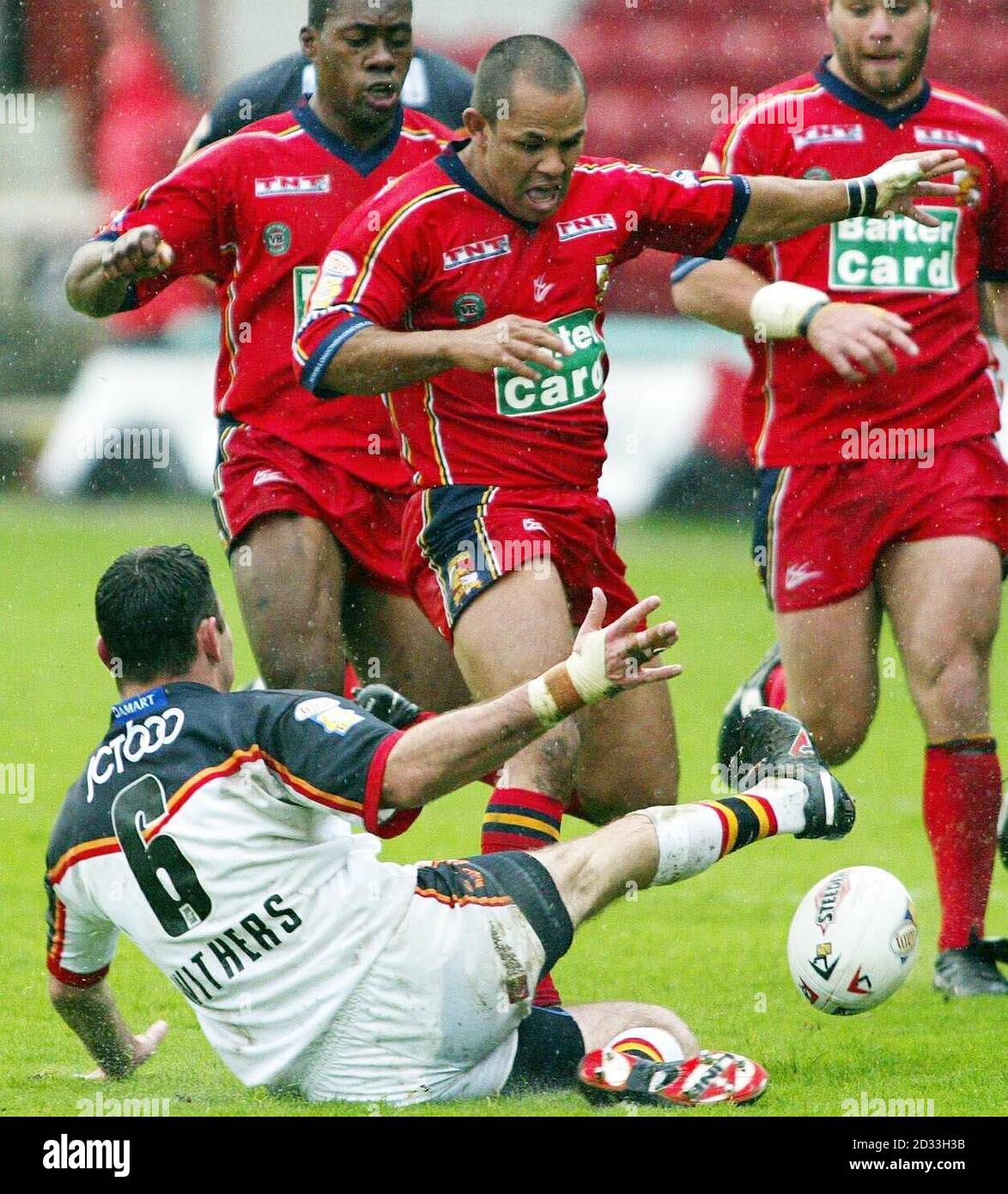 Bradford Bulls' Michael Withers (left) challenges London Broncos' Denis ...