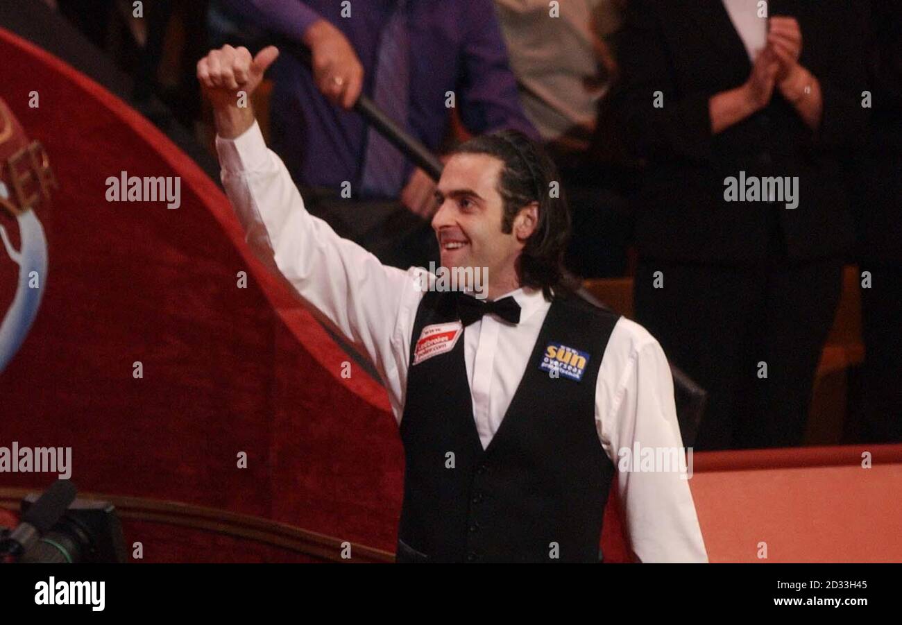 England's Ronnie O'Sullivan celebrates after beating Scotland's Graeme ...