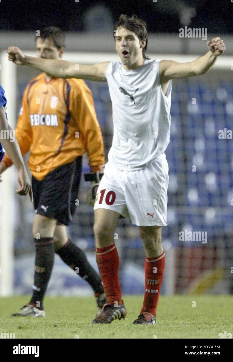 Monaco goalscorer Morientes celebrates victory after beating Chelsea ...
