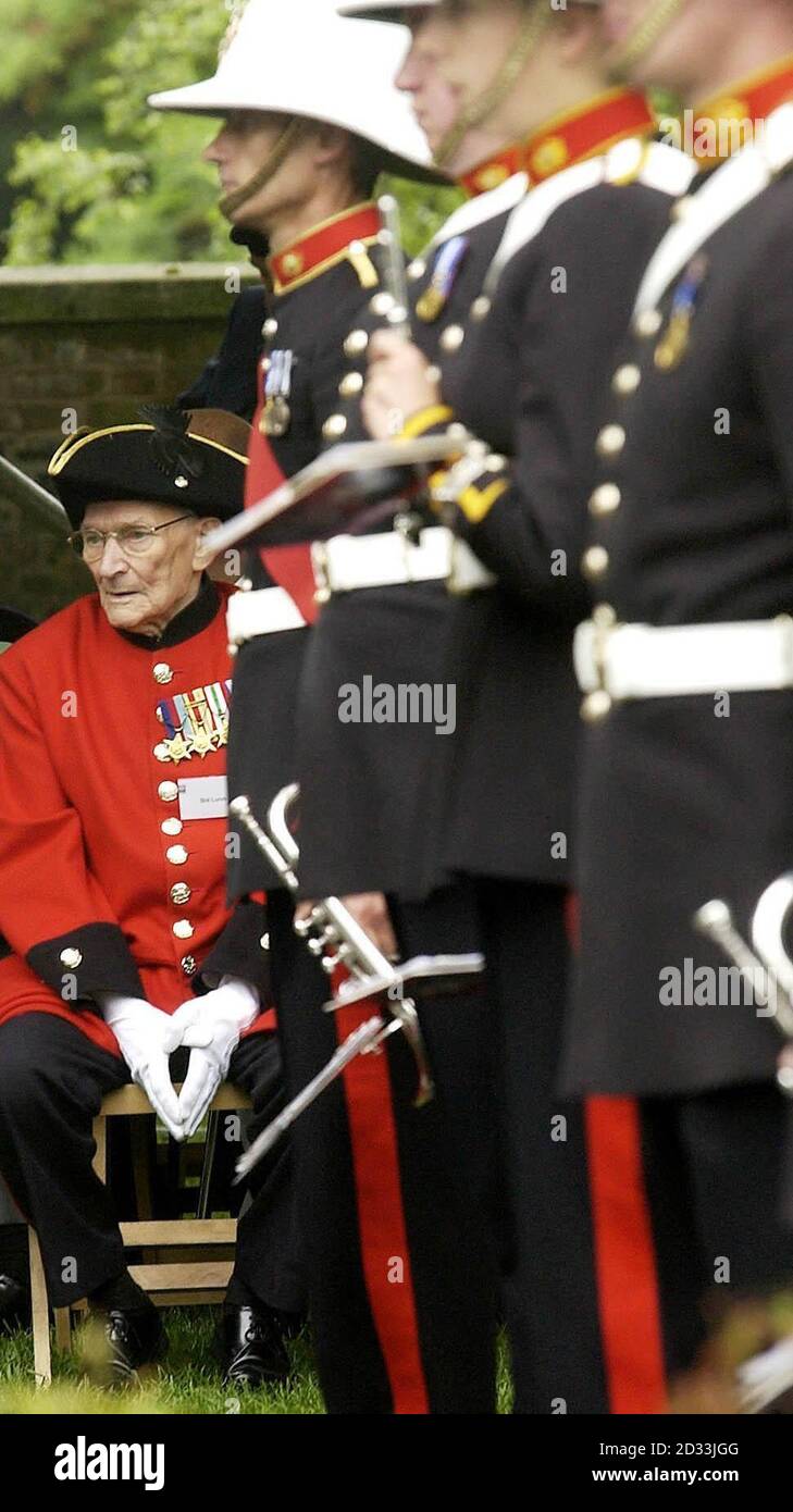 Chelsea Pensioner and D-Day veteran Sid Lunn watches a Royal Marine ...