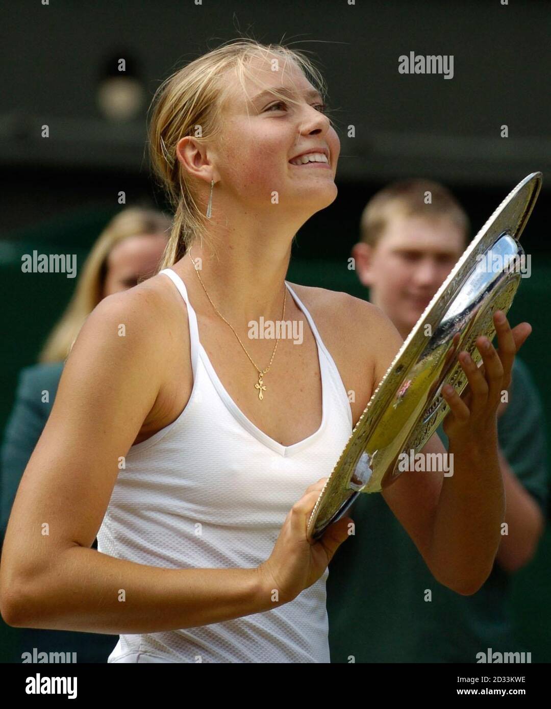 Maria Sharapova from Russia holds the Venus Rosewater dish after ...