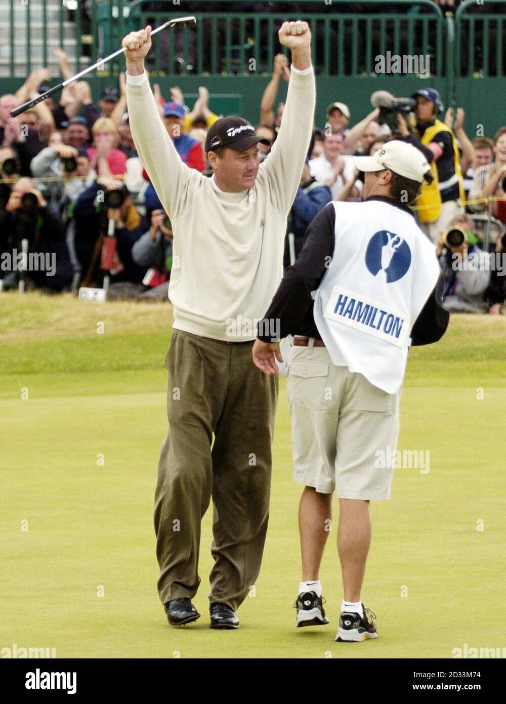 USA's Todd Hamilton celebrates with his caddy (right) after winning The ...