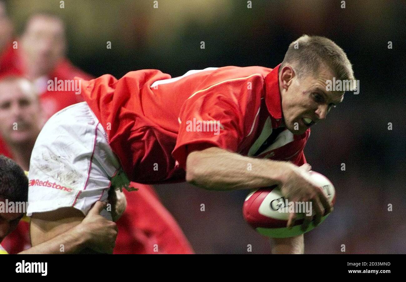 Wales' Daffyd James goes over to score the first try during the Rugby ...