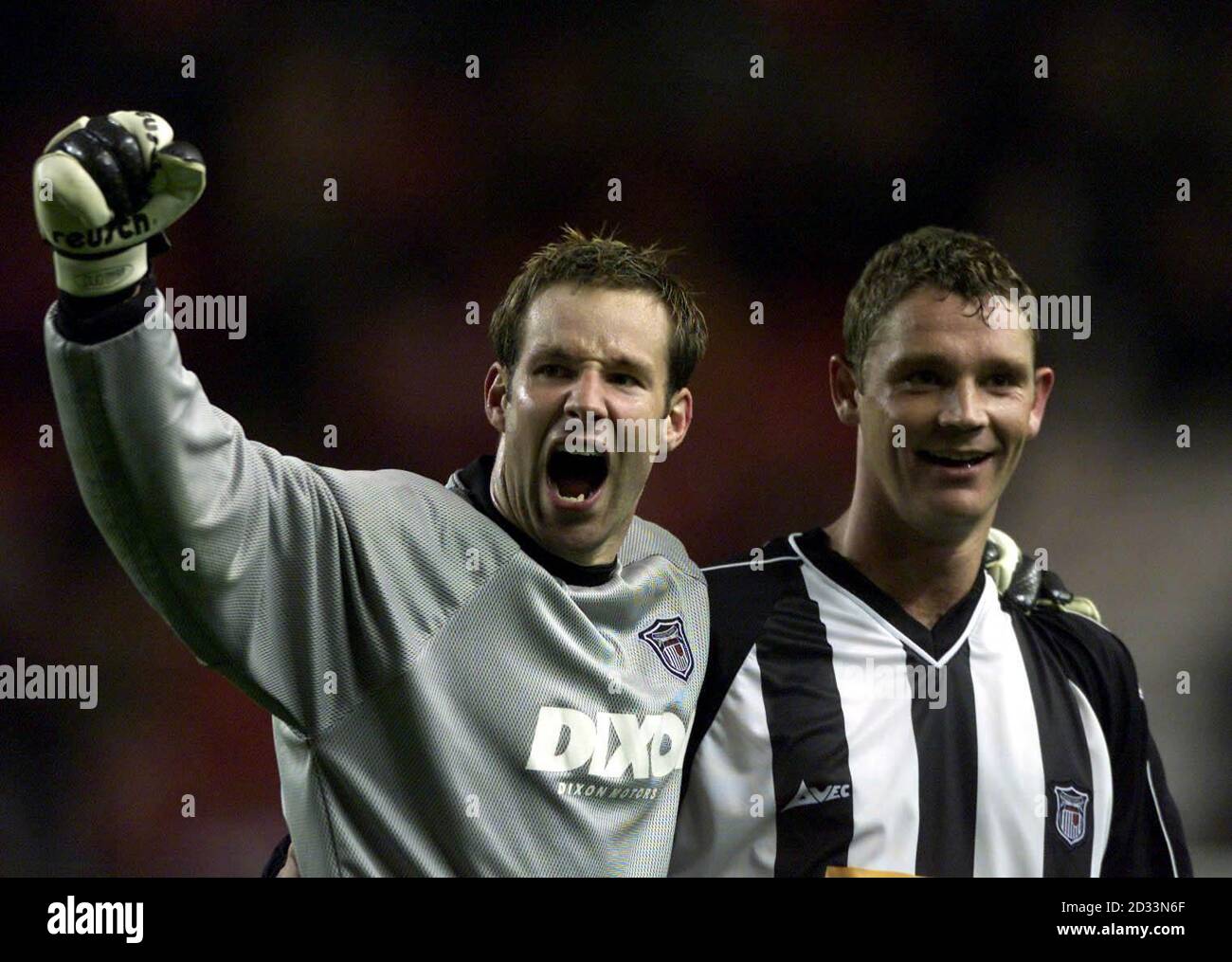Grimsby Town's goalkeeper Danny Coyne (left) and Tony Gallimore ...