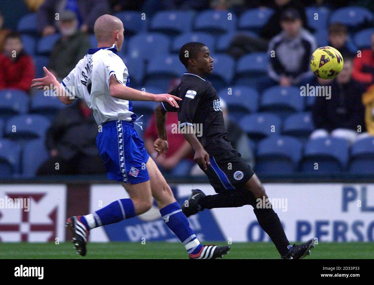Hudderfield's Leon Knight battles with Oldham's Chris Armstrong during ...
