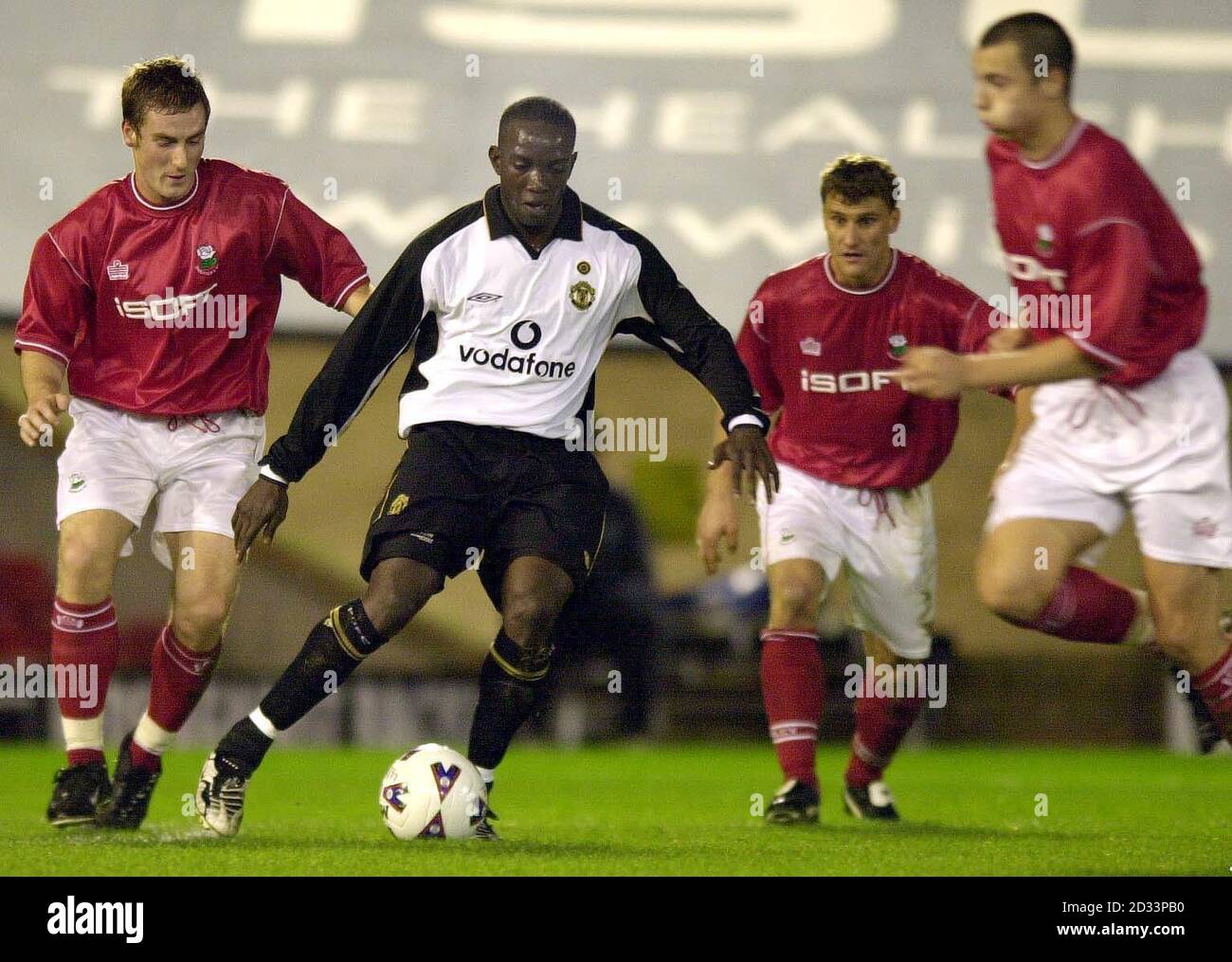 Manchester United's Dwight Yorke beats Barnsley's defence during the ...