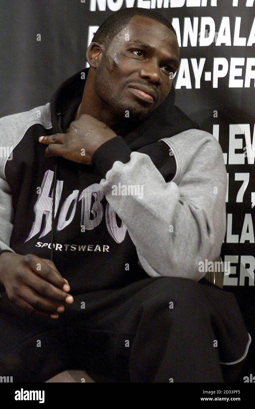 World Heavyweight boxing champion Hasim Rahman sits calmly waiting for ...