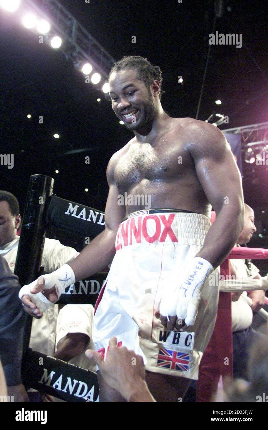 Great Britain's new heavyweight boxing champion Lennox Lewis smiles as ...