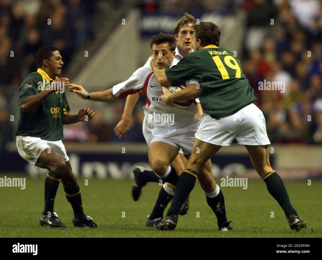 England's Dan Luger is tackled by South Africa's Crone Krige (right ...