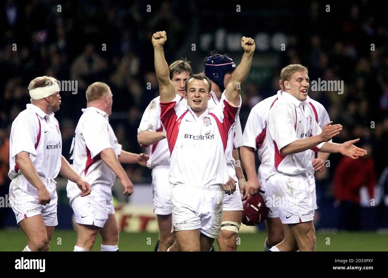 England's Austin Healey (centre) leads the celebrations at the final ...