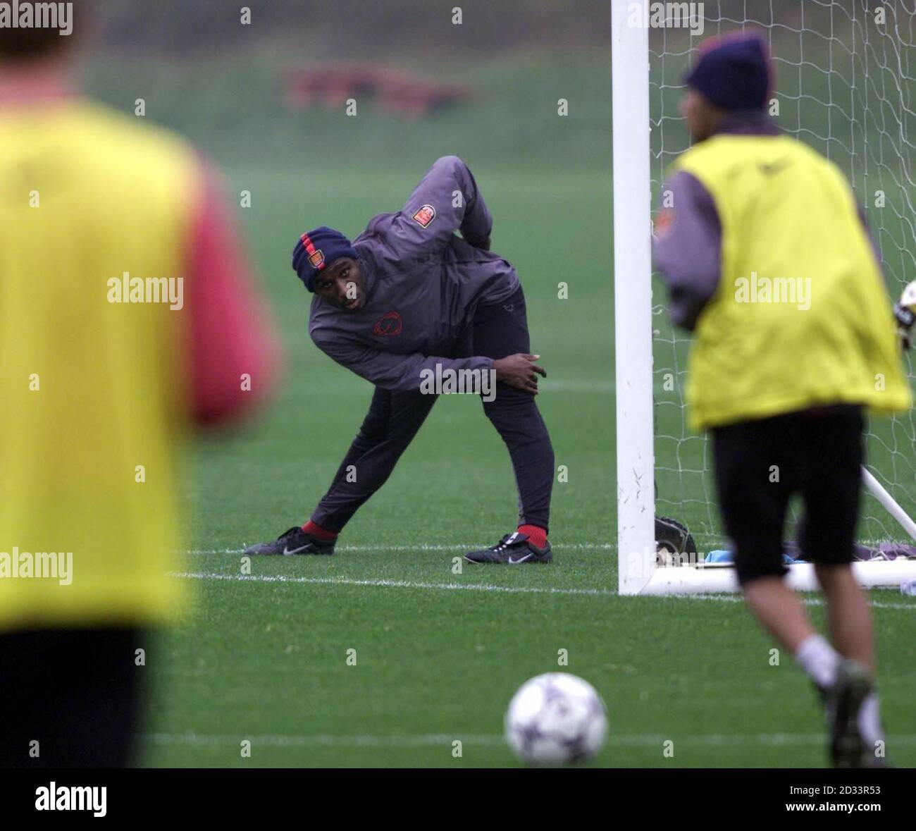 England's Wayne Bridge (right) is challenged by Albania's Amarildo ...
