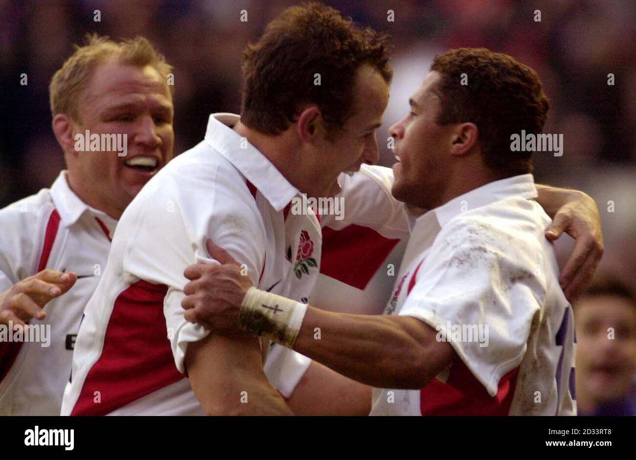England's Jason Robinson (centre), celebrates his first with Austin ...