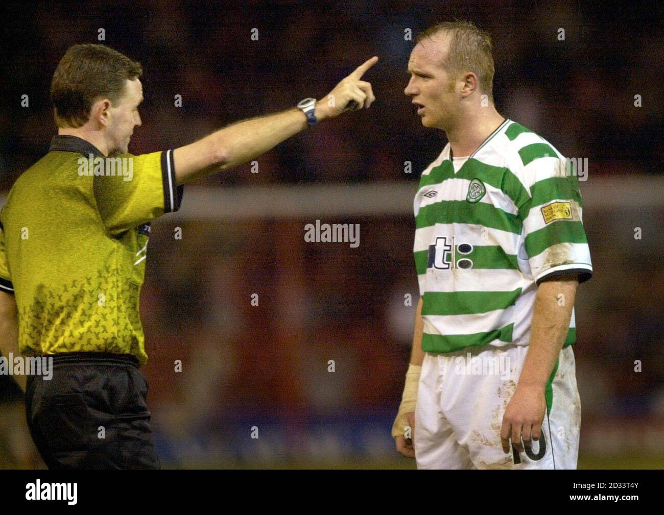 Celtic striker John Hartson is sent off by referee Hugh Dallas after ...