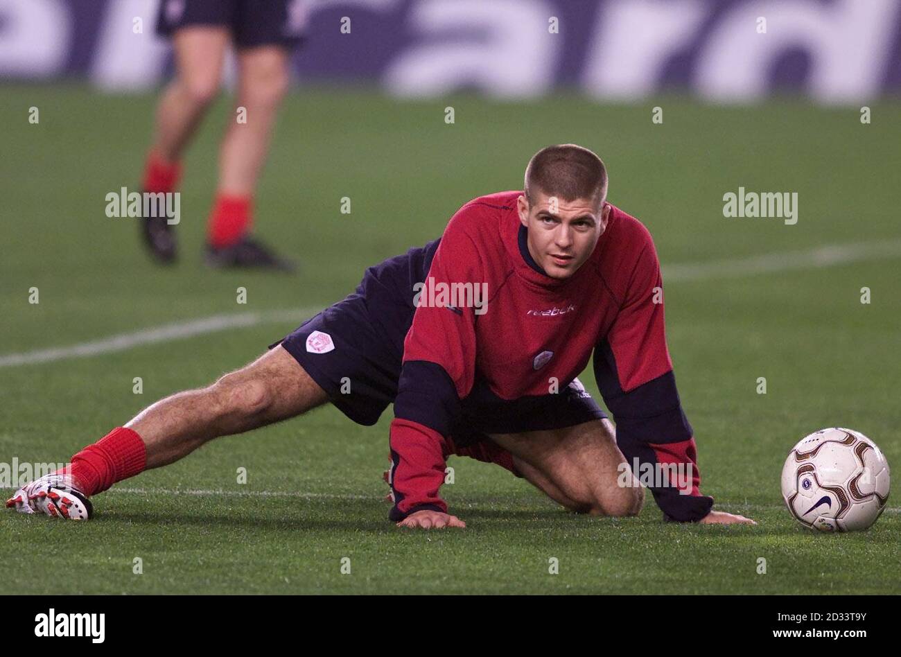 Liverpool's Steven Gerrard stretches his troublesome groin, during ...