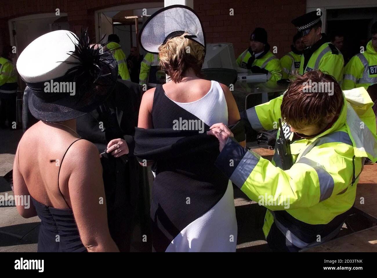 Police search teams search race fans before The Martell Grand National ...
