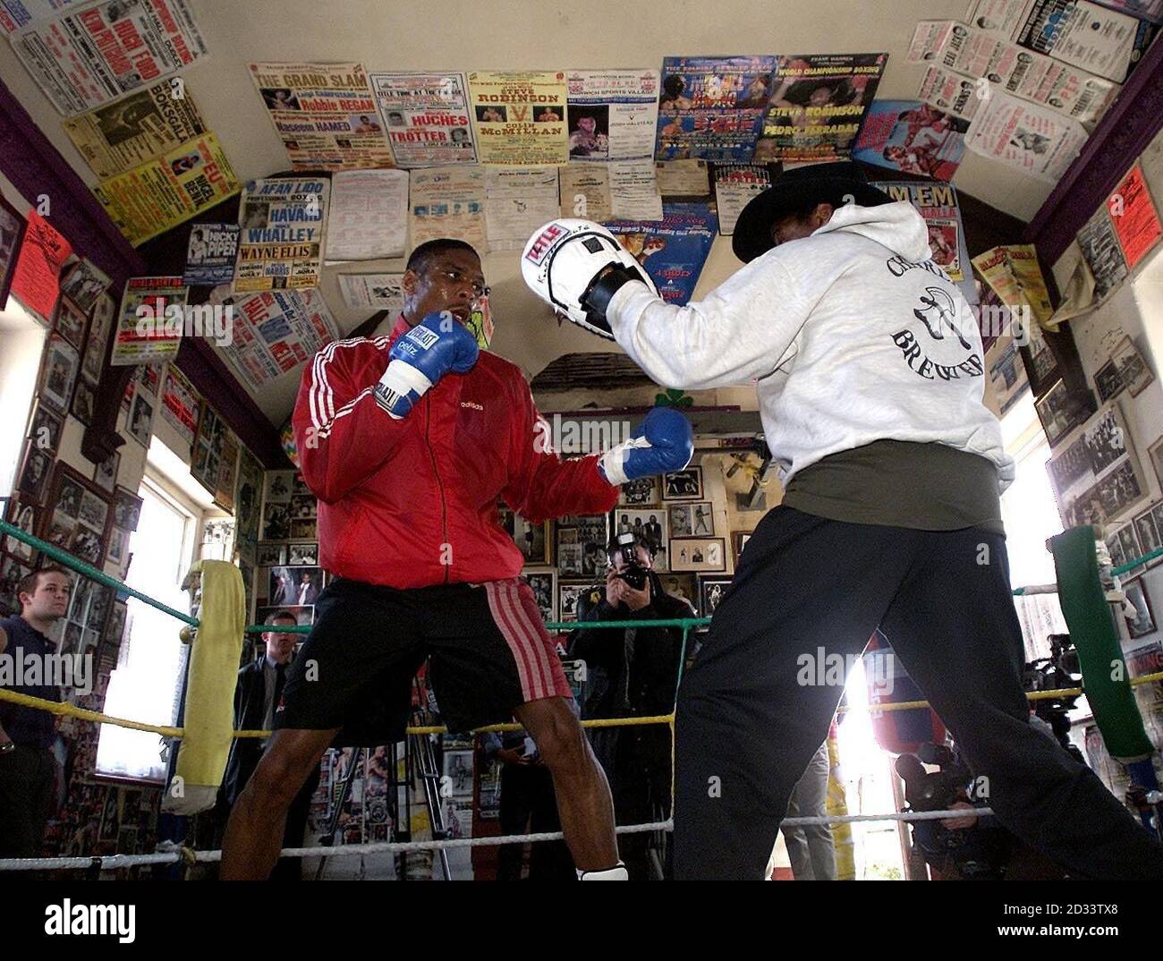 Boxer Charles Brewer (left) trains at Driscoll Jim (sic) in Cardiff ...