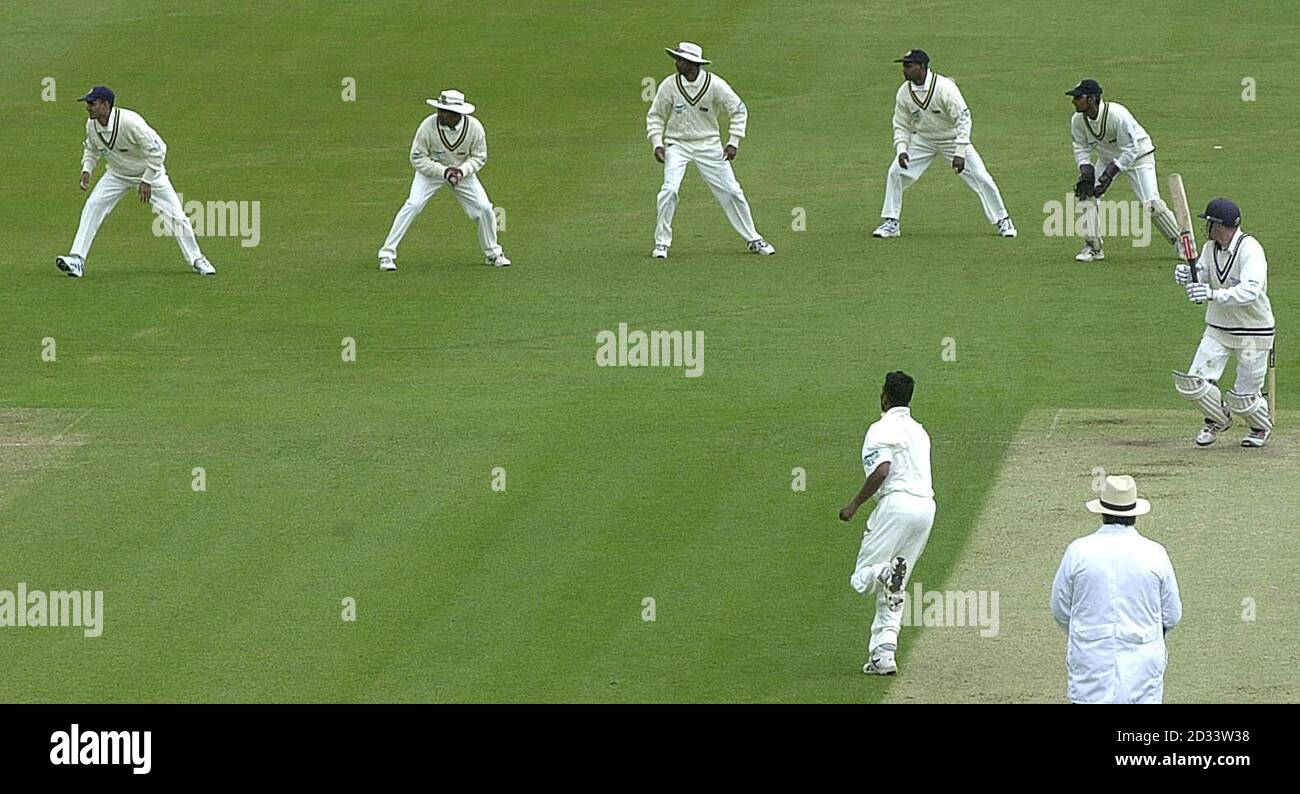 Sri Lankan slip fielders watch as Kent's David Fulton (right) scores 4 ...