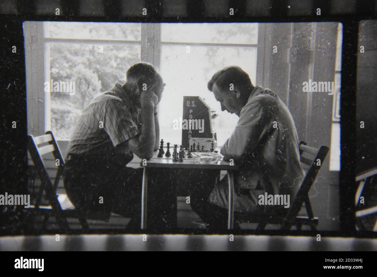 Fine 1970s vintage black and white photography of two men playing a ...