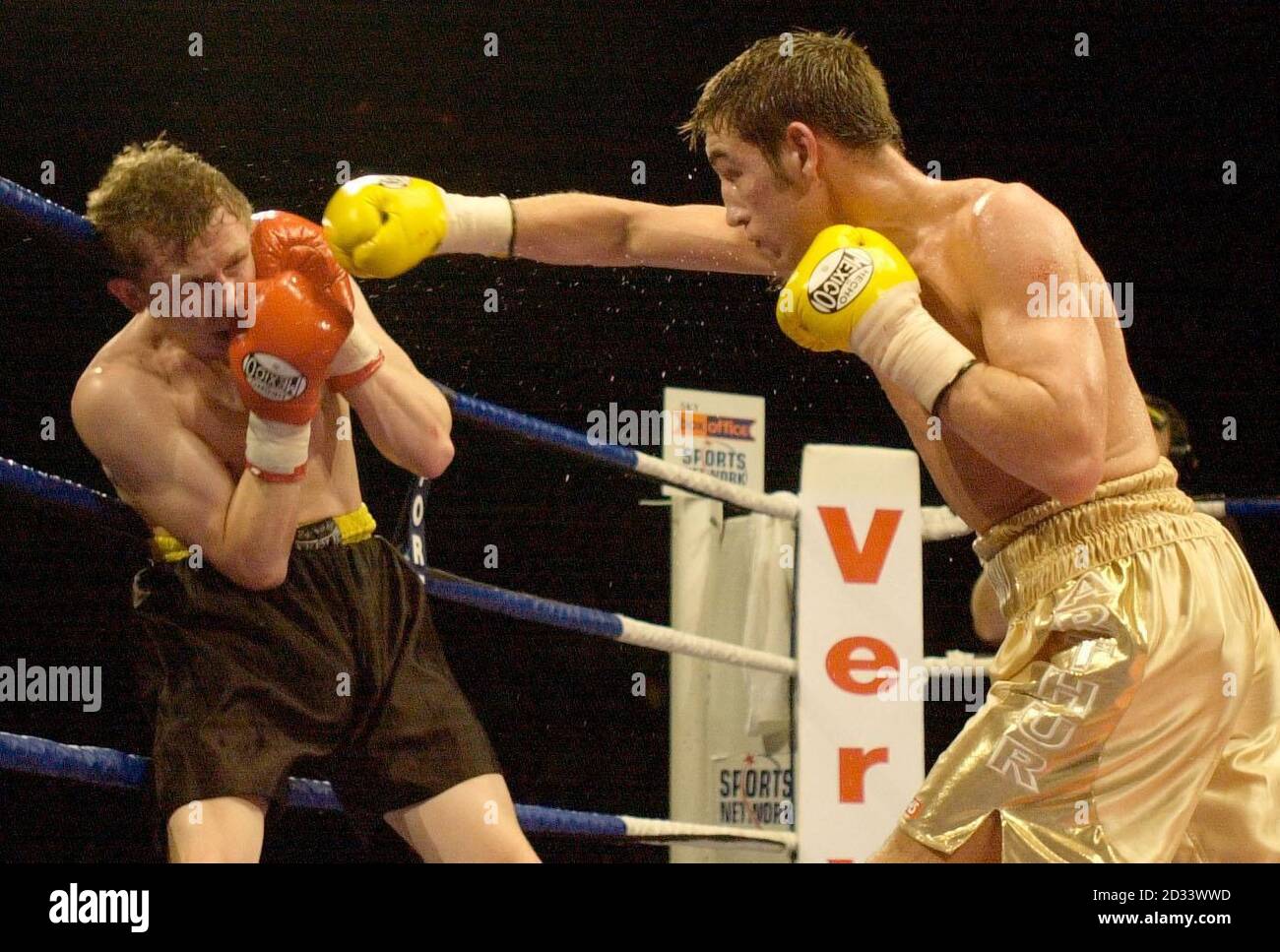 Scotland's Alex Arthur (right) punishes Russia's Nikolai Eremeev to ...