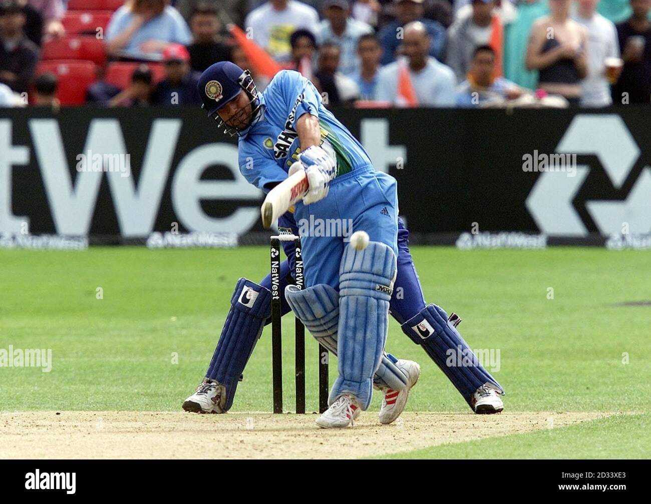 India's Sachin Tendulkar hits a boundary off the bowling of Sri Lanka's ...