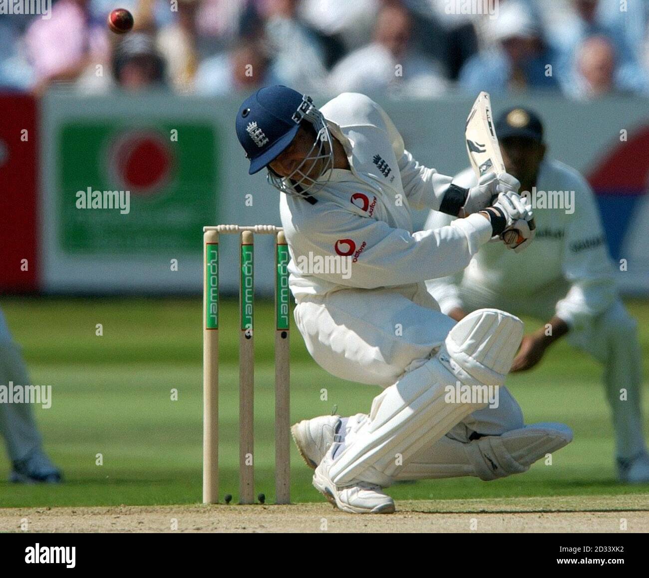 England's Mark Butcher ducks a bouncer from India's Ajit Agarka, during ...