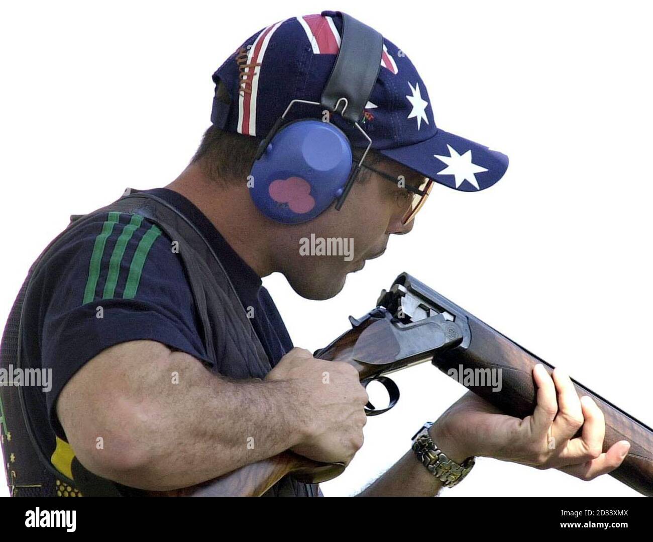 Australian Michael Diamond looks down the barrel of his gun during the ...