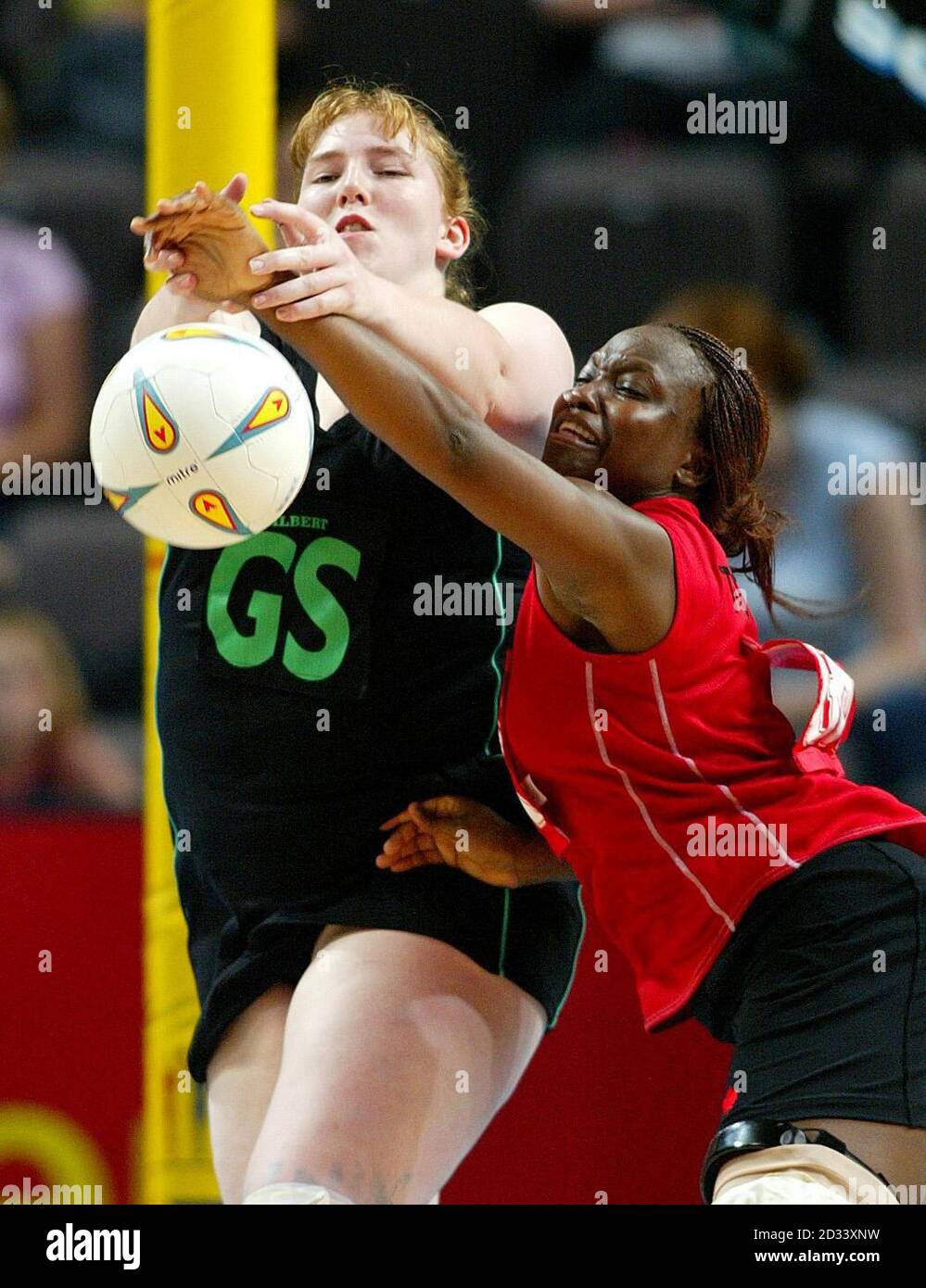 Wales Goalshooter Mair Jones (L) battles with Canada's Goalkeeper ...