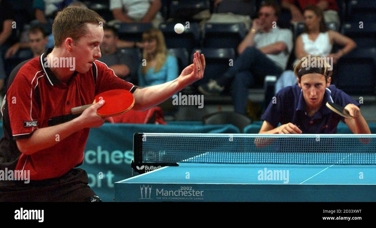 Wales's Ryan Jenkins serves to England's Alex Perry during the Singles ...