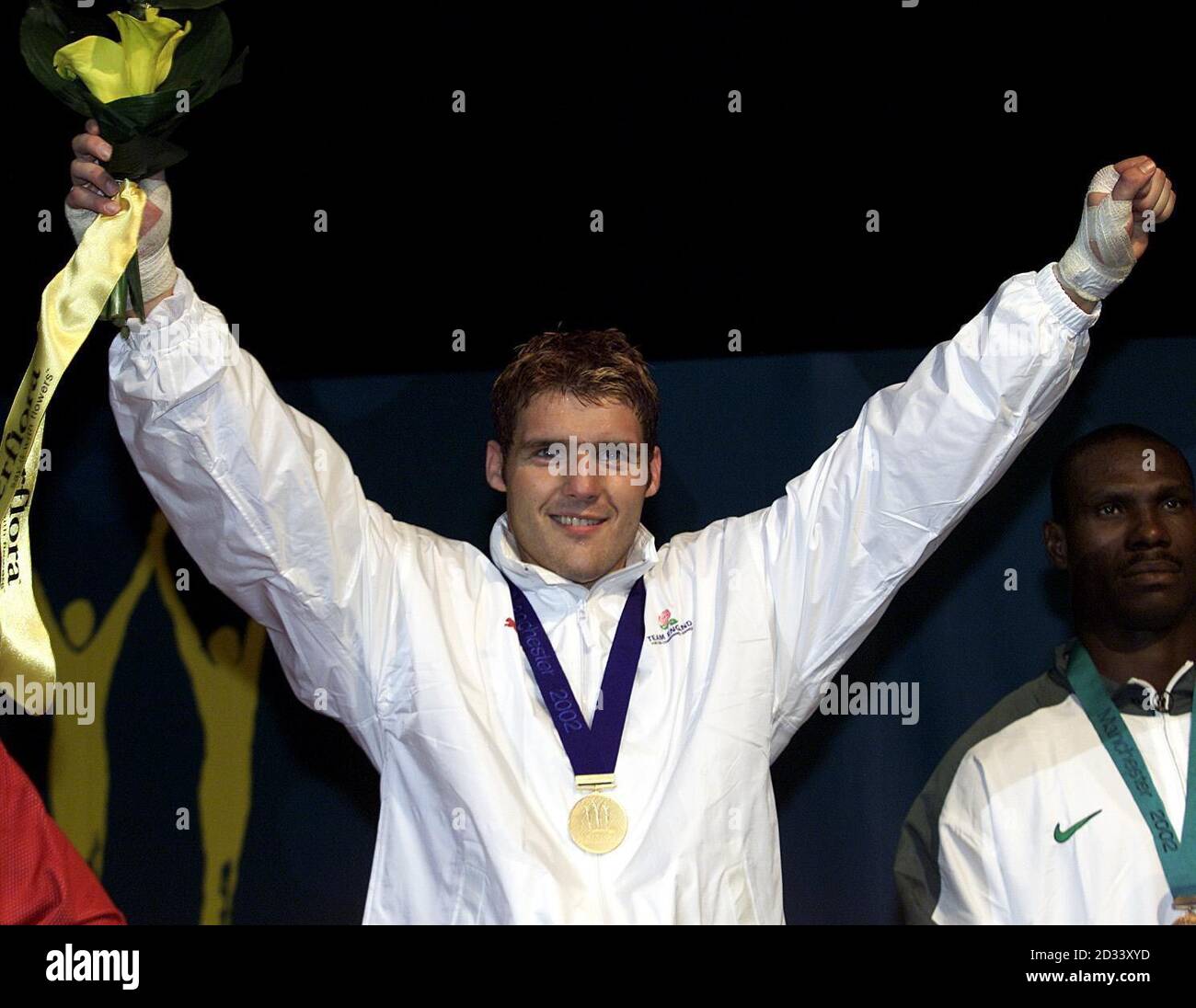 Boxing celebrating arms raised comgal hi-res stock photography and ...