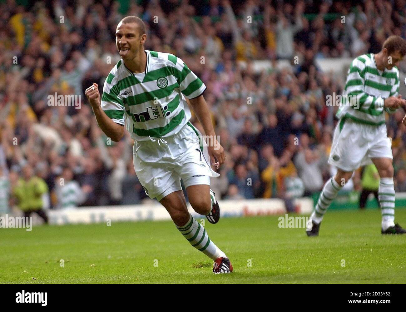Henrik larsson celebrates scoring celtic hi-res stock photography and ...