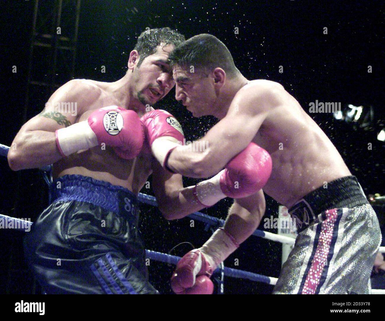 Takaloo (right) from Margate is stunned by left uppercut during his ...