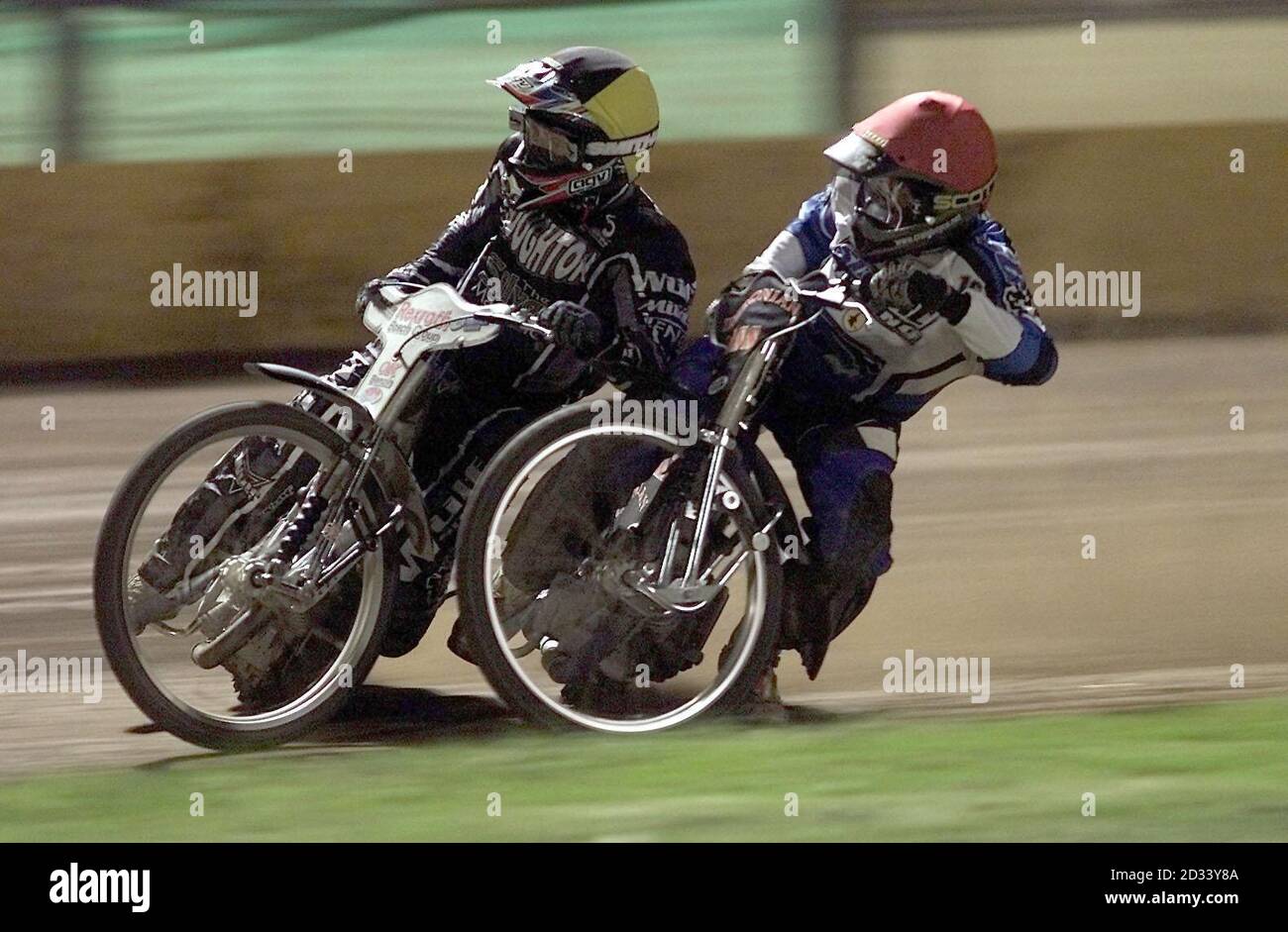 Nicki Pedersen leads Craig Boyce into the first corner during Elite ...