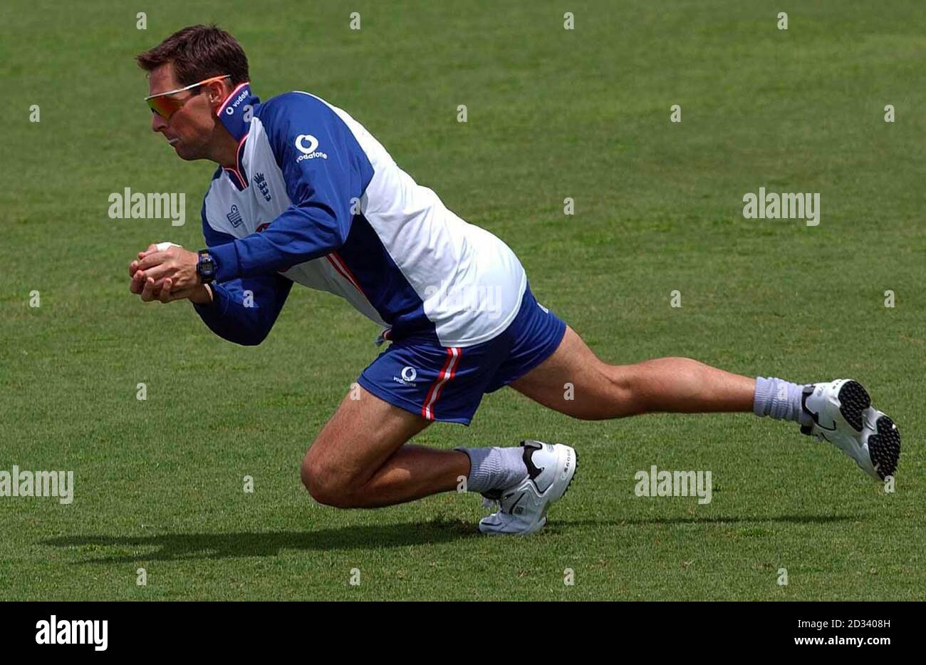England cricketer Marcus Trescothick takes a slip catch during practice ...