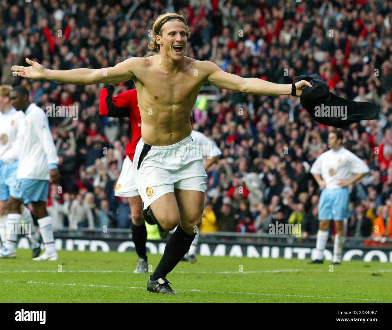 Sport football celebrating action diego forlan hi-res stock photography ...