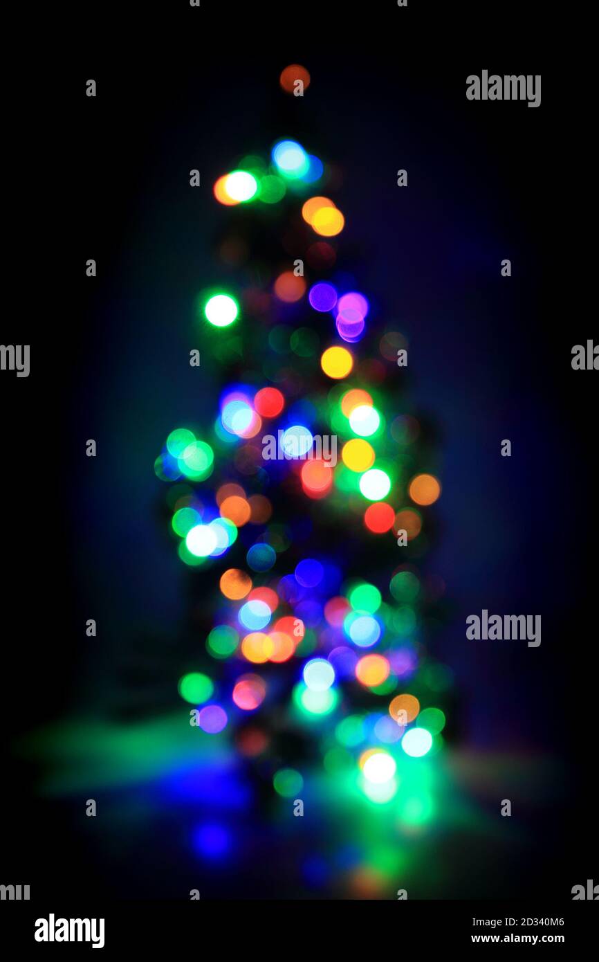 christmas tree from the color lights in the night Stock Photo - Alamy