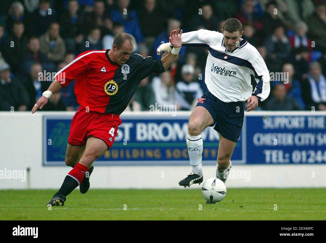 Vauxhall Motors' Robbie Lawton (right) in action against QPR's Steve ...