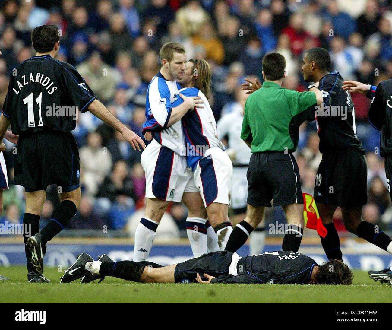 Blackburn Rovers'Andy Todd (2nd left) is pushed away by team mate Tugay ...