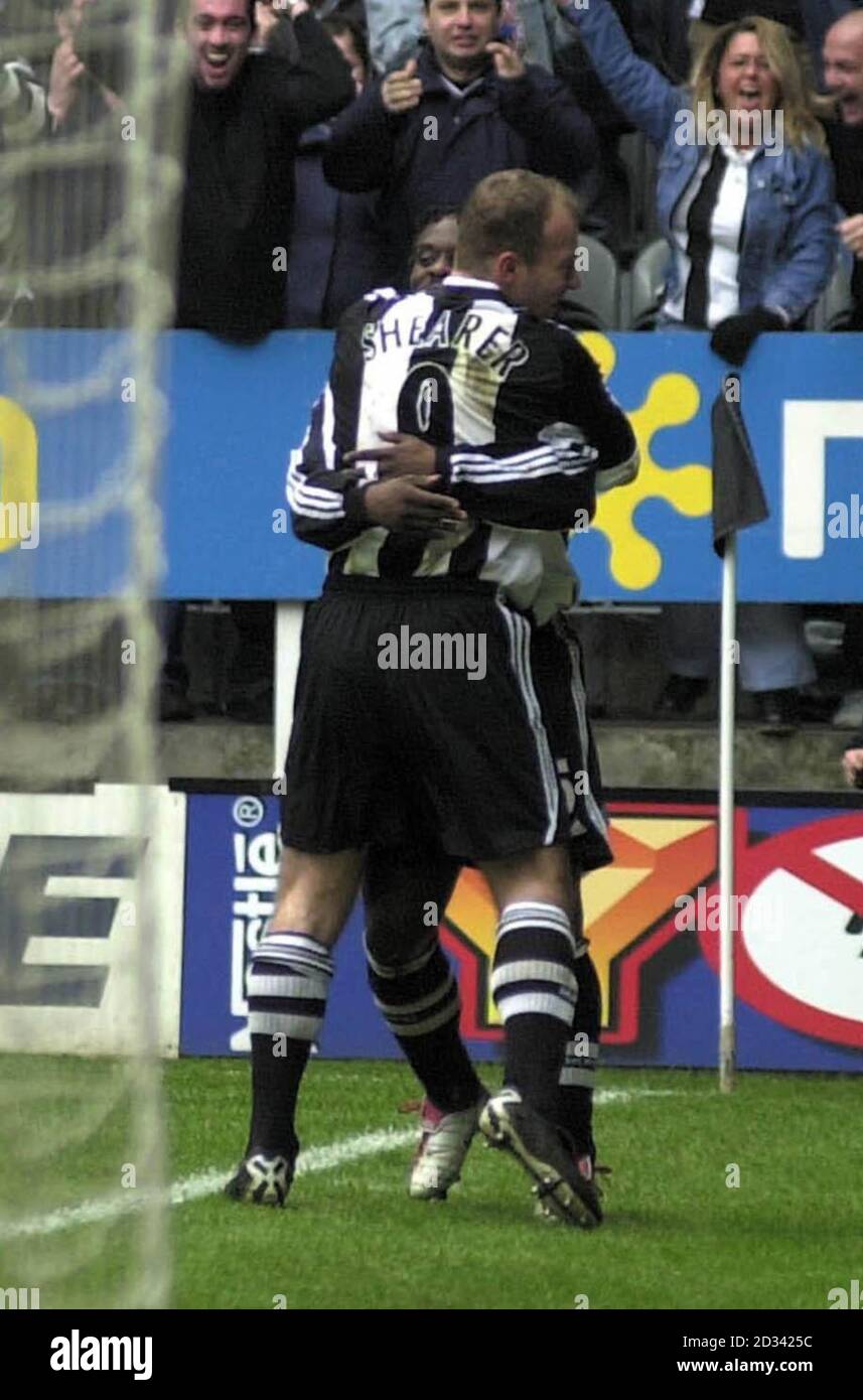 Sport football celebrating hugging alan shearer hi-res stock ...