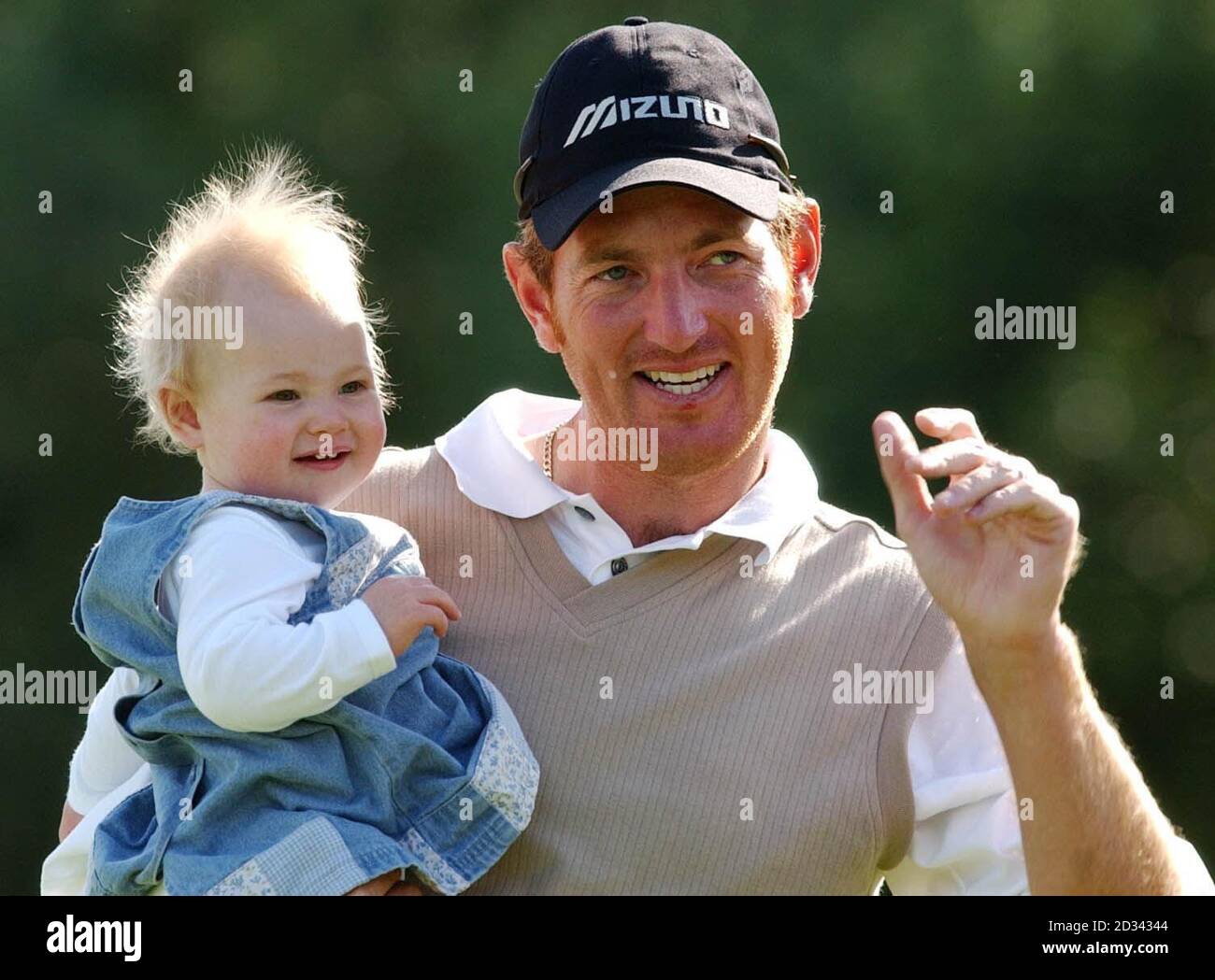 England's Greg Owen celebrates with his daughter Lauren after winning ...