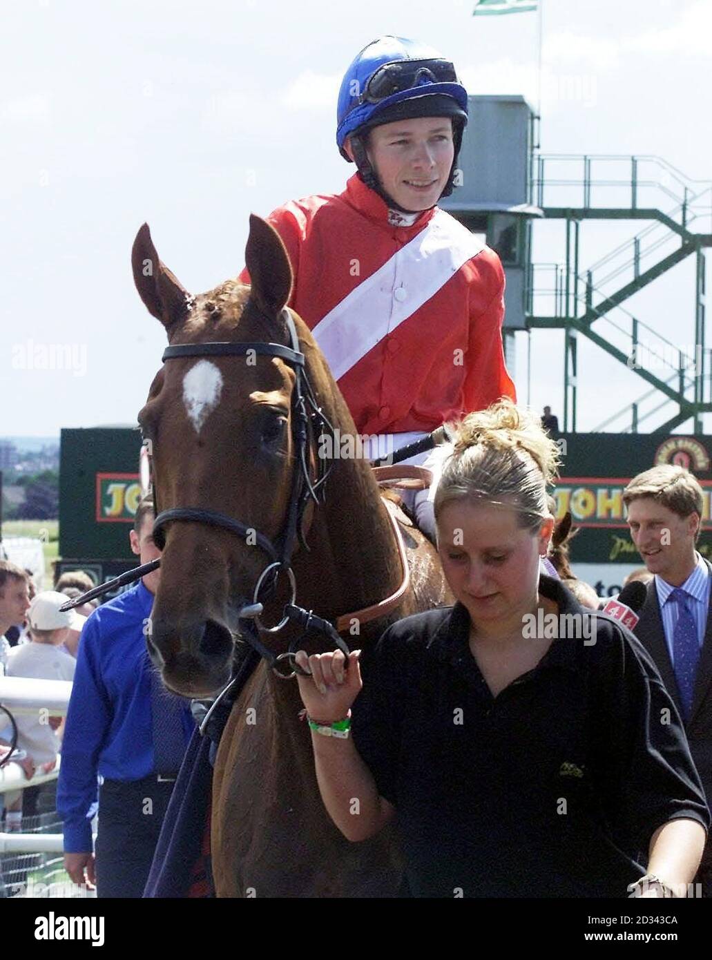 Unleash with jockey Jamie Spencer walks to the winners enclosure after ...
