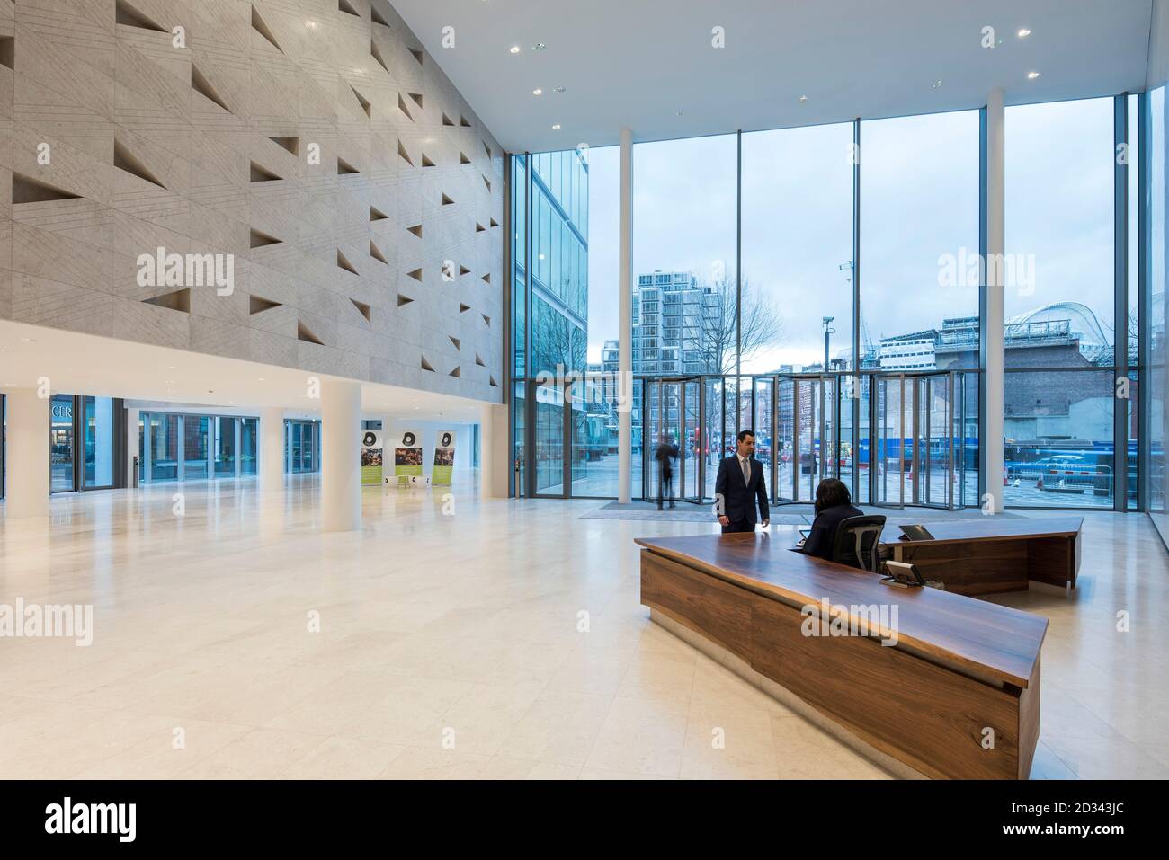 View from reception to Victoria. The large walnut desk is by Benchmark ...