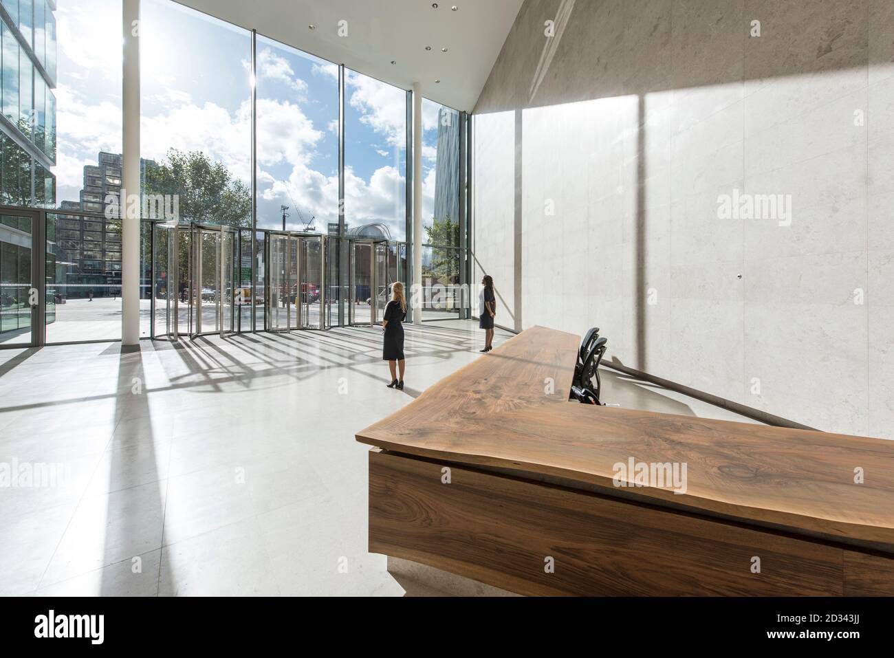 View from reception to Victoria. The large walnut desk is by Benchmark ...