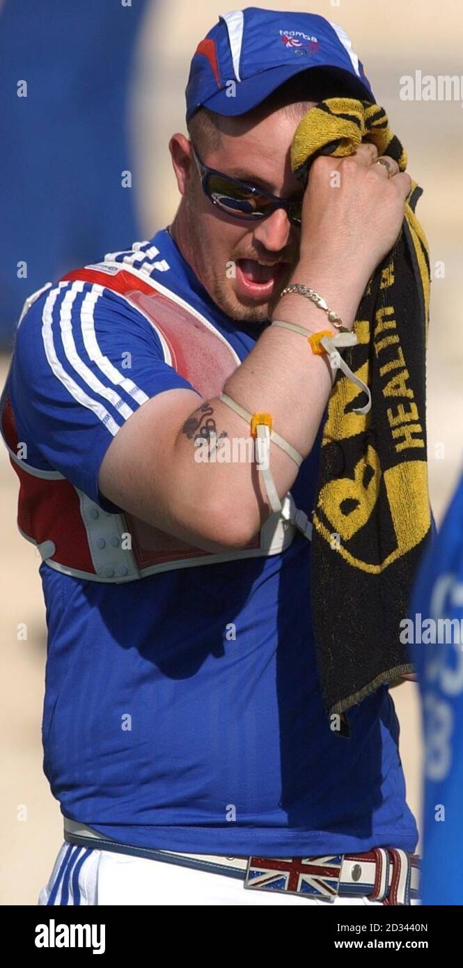British archer Laurence Godfrey reacts after losing his Bronze Medal ...
